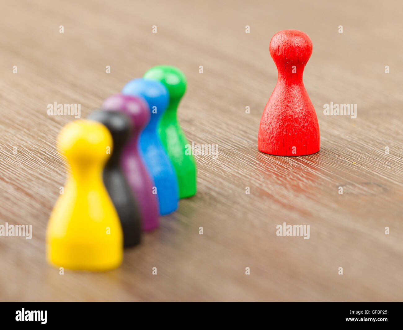 Six colored pawns isolated Stock Photo - Alamy