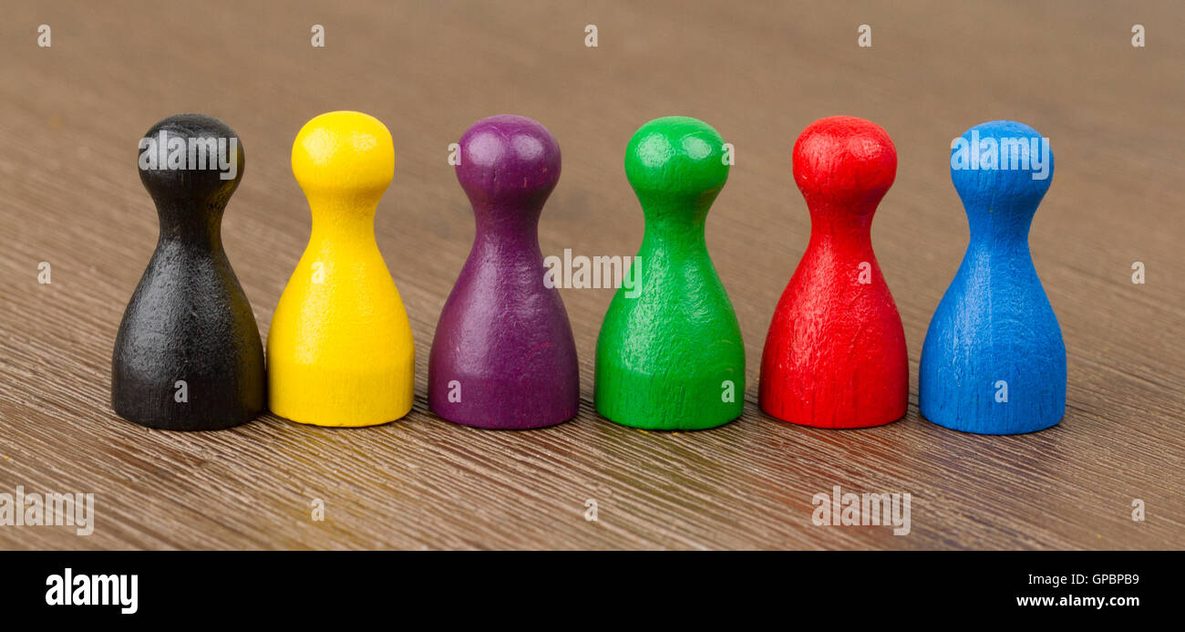 Six colored pawns isolated Stock Photo - Alamy