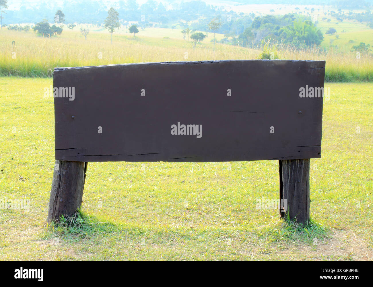 A blank wooden sign ready for your text Stock Photo - Alamy