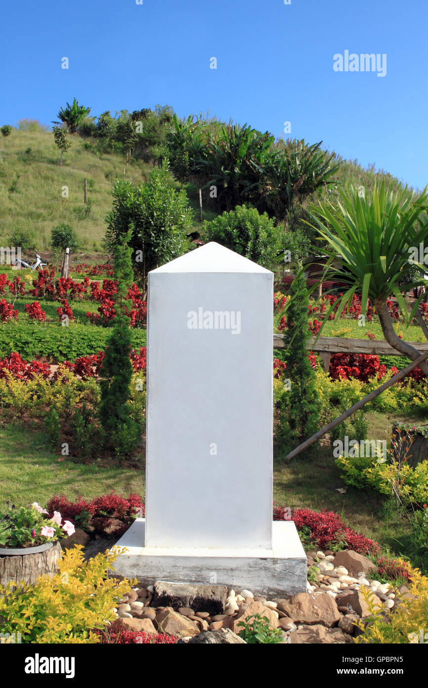 milestone on the road with mountain and blue sky background Stock Photo ...
