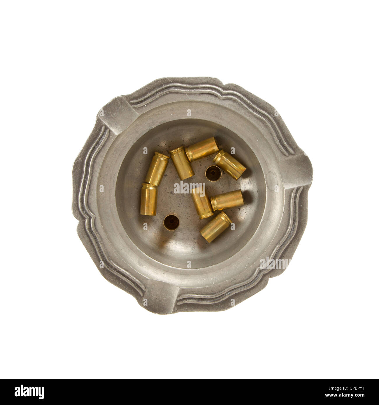 Burning cigarette and empty 9mm bullet casings in an old tin ash Stock ...