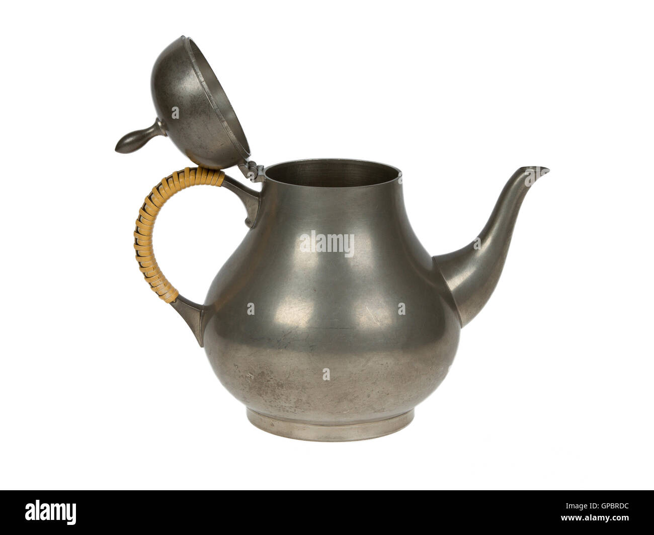 Very old tin tea pot full of scratches Stock Photo - Alamy