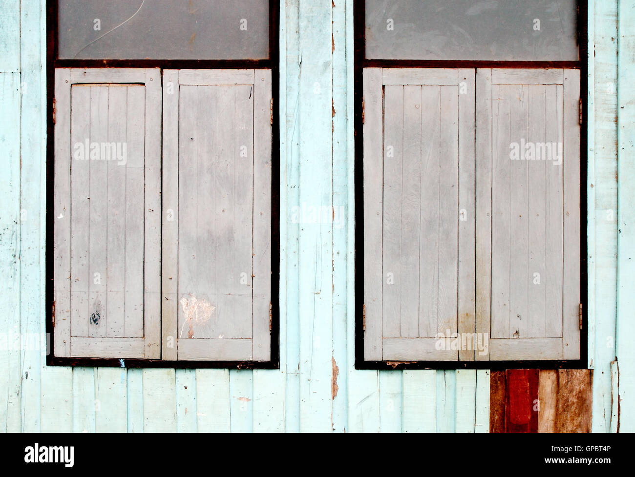 two wooden window on wooden wall Stock Photo - Alamy