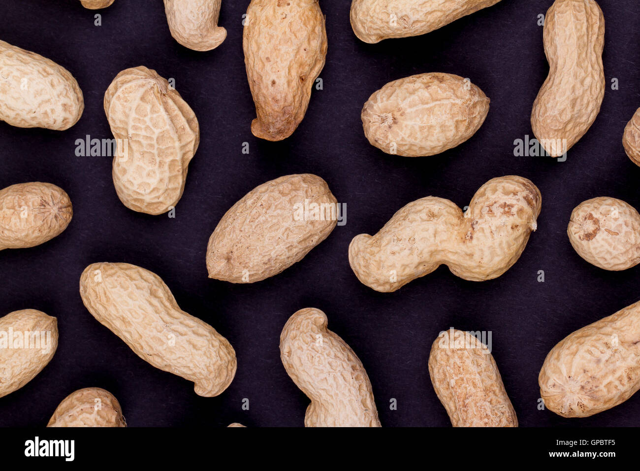 Roasted in-shell peanuts Stock Photo - Alamy
