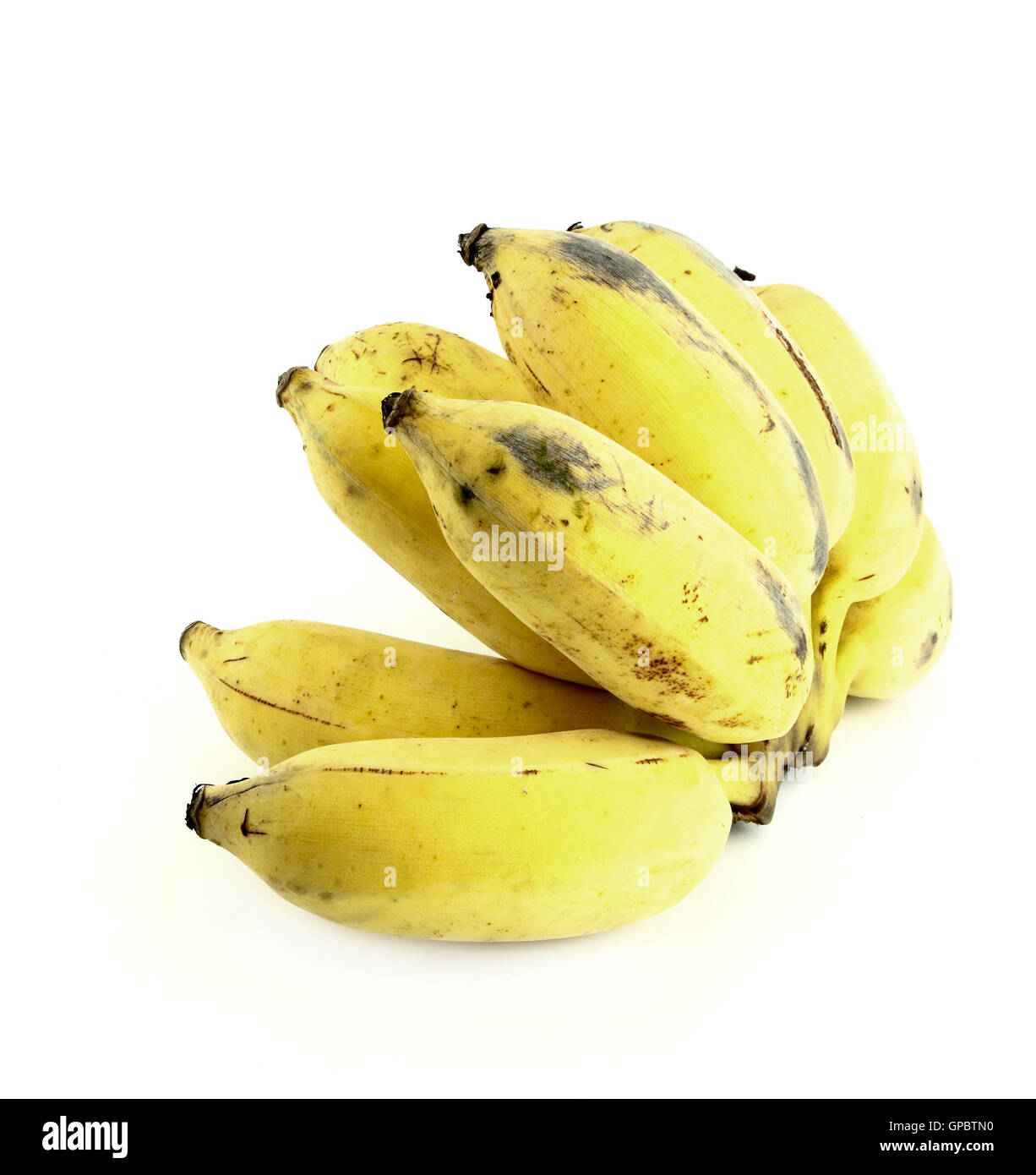 bunch of over ripe bananas on white background Stock Photo - Alamy