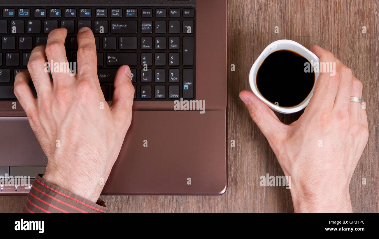 Coffee with laptop Stock Photo - Alamy