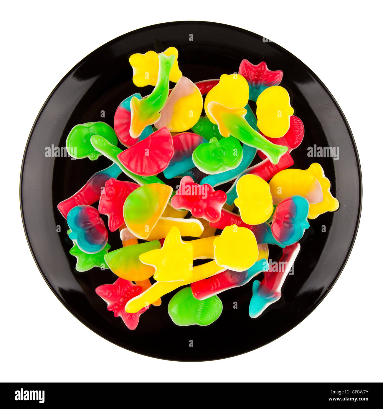 Colorful candies in many different shapes isolated on a black pl Stock ...