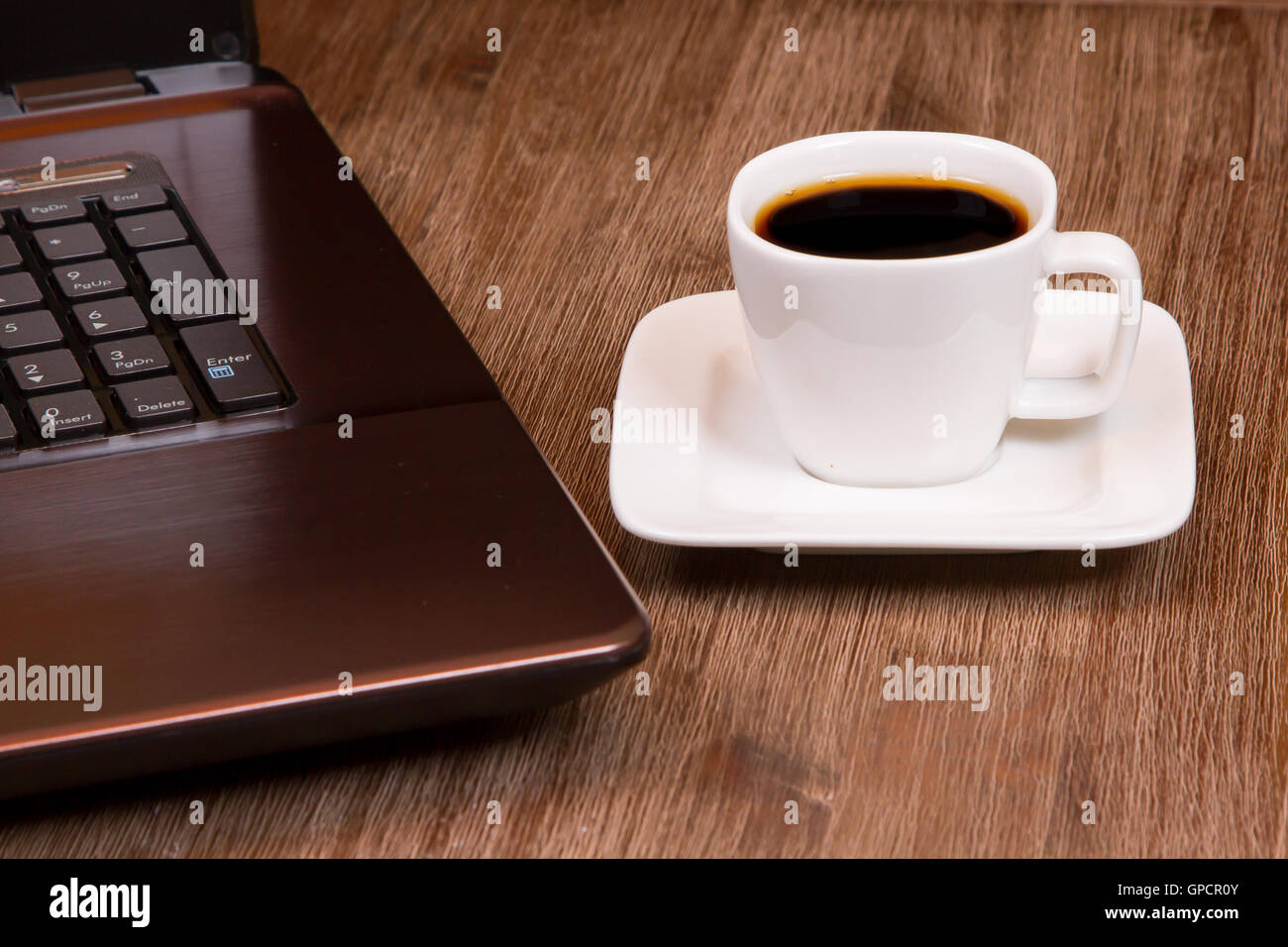 Espresso coffee with laptop Stock Photo - Alamy