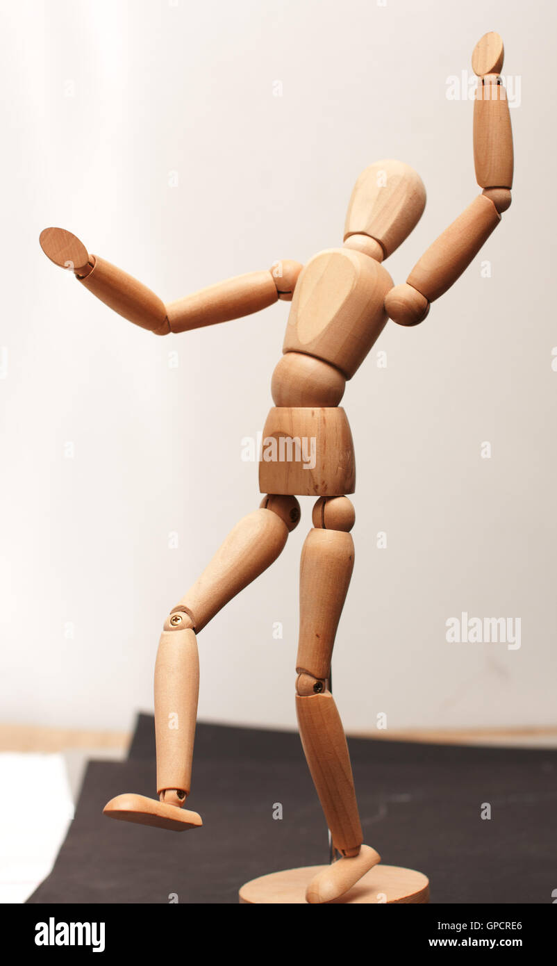 Wood manequin dancing Stock Photo - Alamy