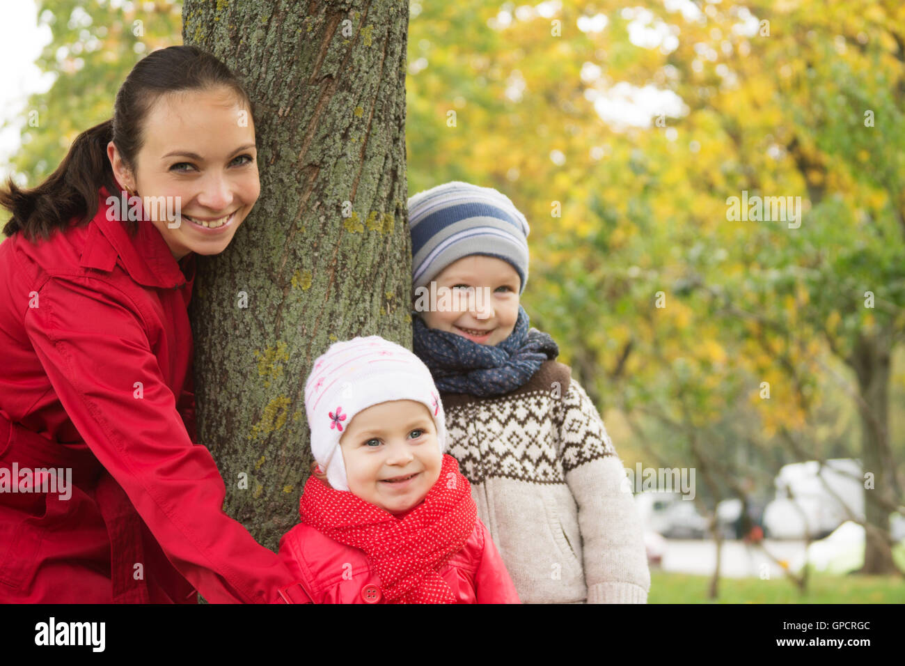Happy mother and two children Stock Photo - Alamy