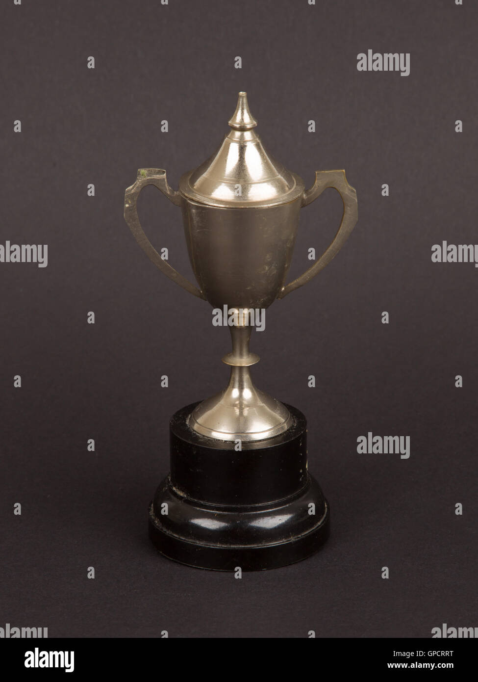Very old trophy cup isolated Stock Photo - Alamy