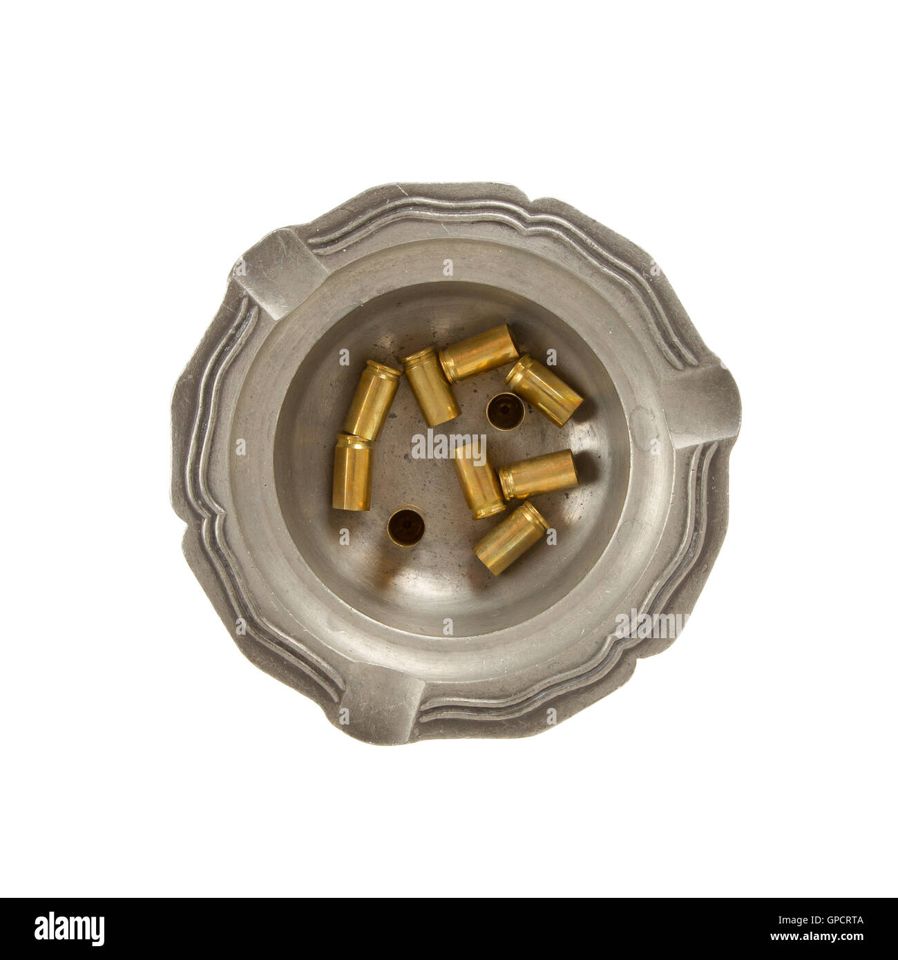 Burning cigarette and empty 9mm bullet casings in an old tin ash Stock ...