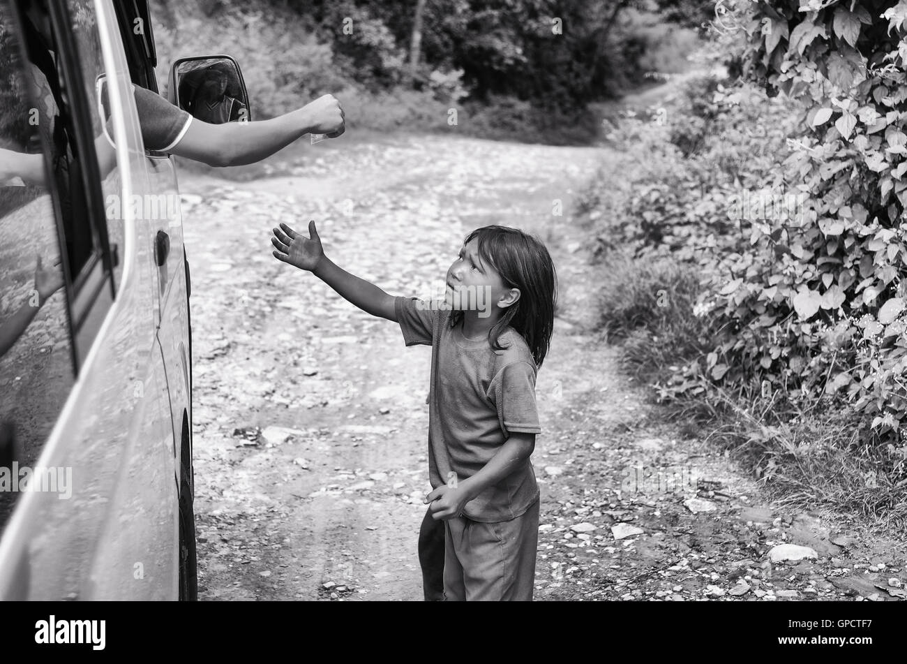 child beggar on the street in nepal Stock Photo - Alamy
