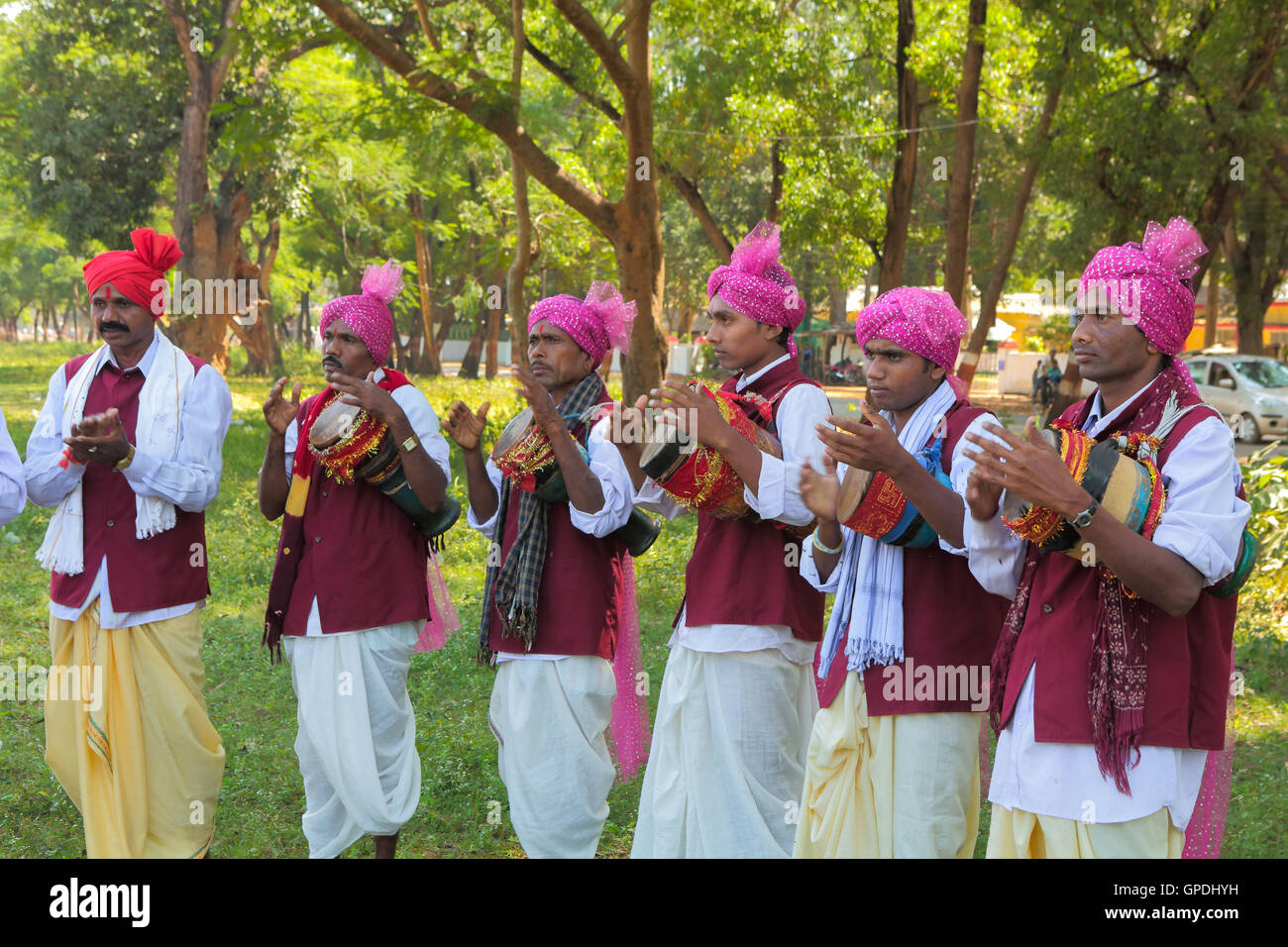Tribal men playing musical instruments hi-res stock photography and ...