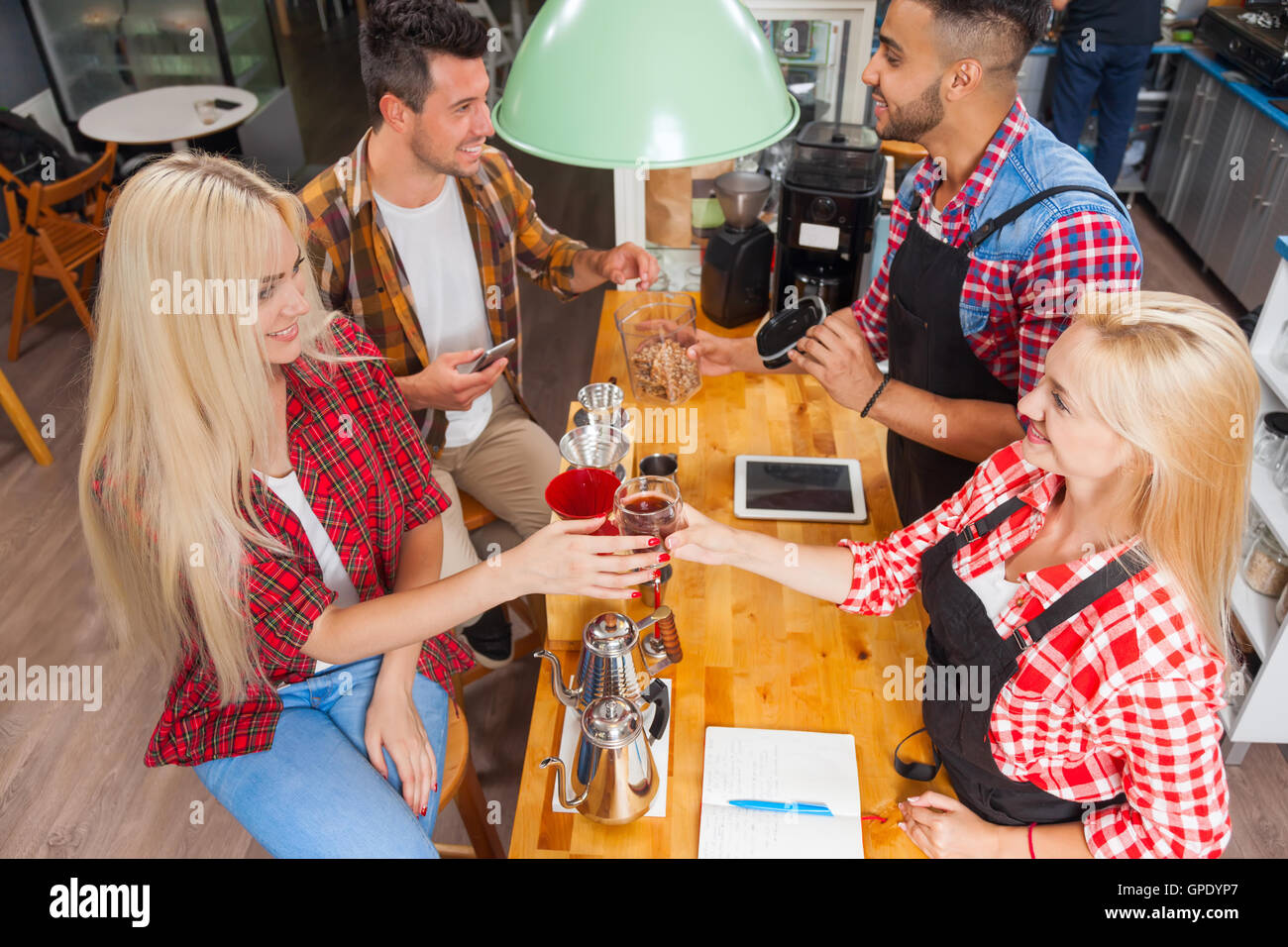 Barista serving clients give cup coffee shop bar counter Stock Photo ...