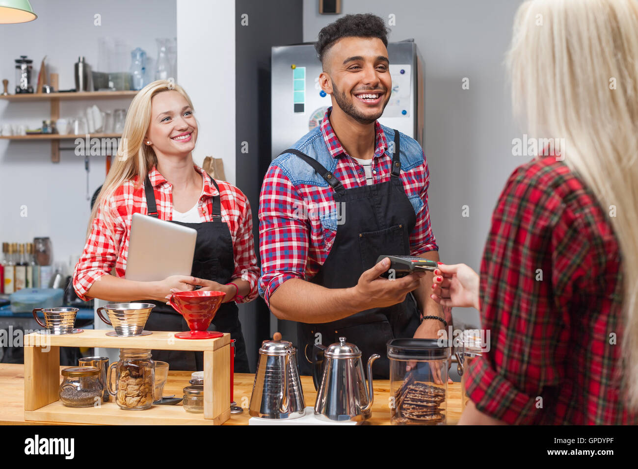 Bartender client pay hi-res stock photography and images - Alamy