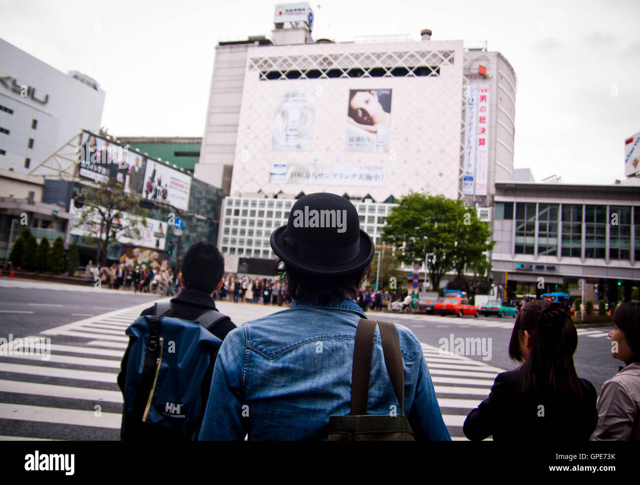 Pedestrians waiting at a zebra crossing in Tokyo, Japan Stock Photo - Alamy