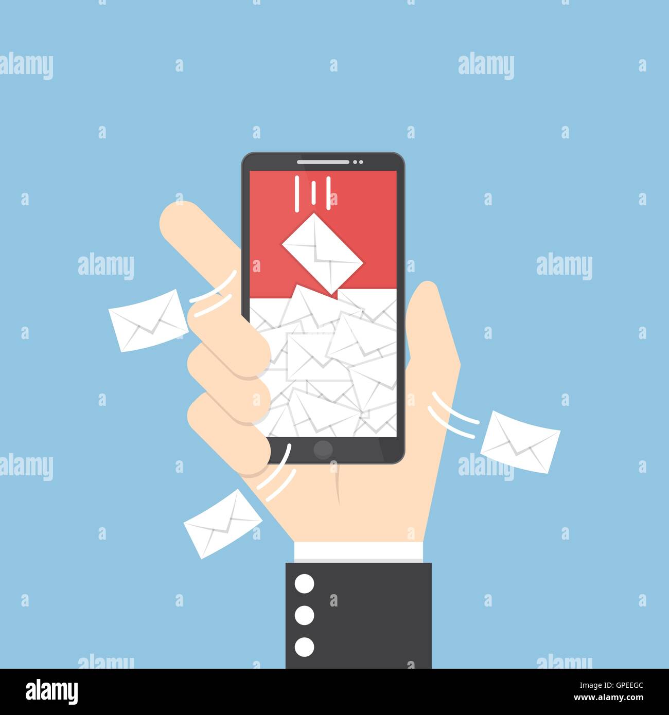 Businessman hand holding smartphone with spaming emails on monitor ...