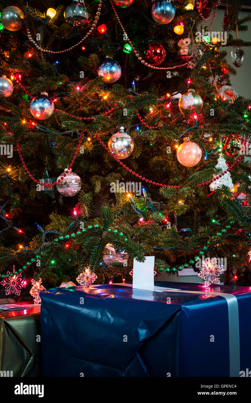 Wrapped Presents under Christmas Tree with Stock Photo - Alamy