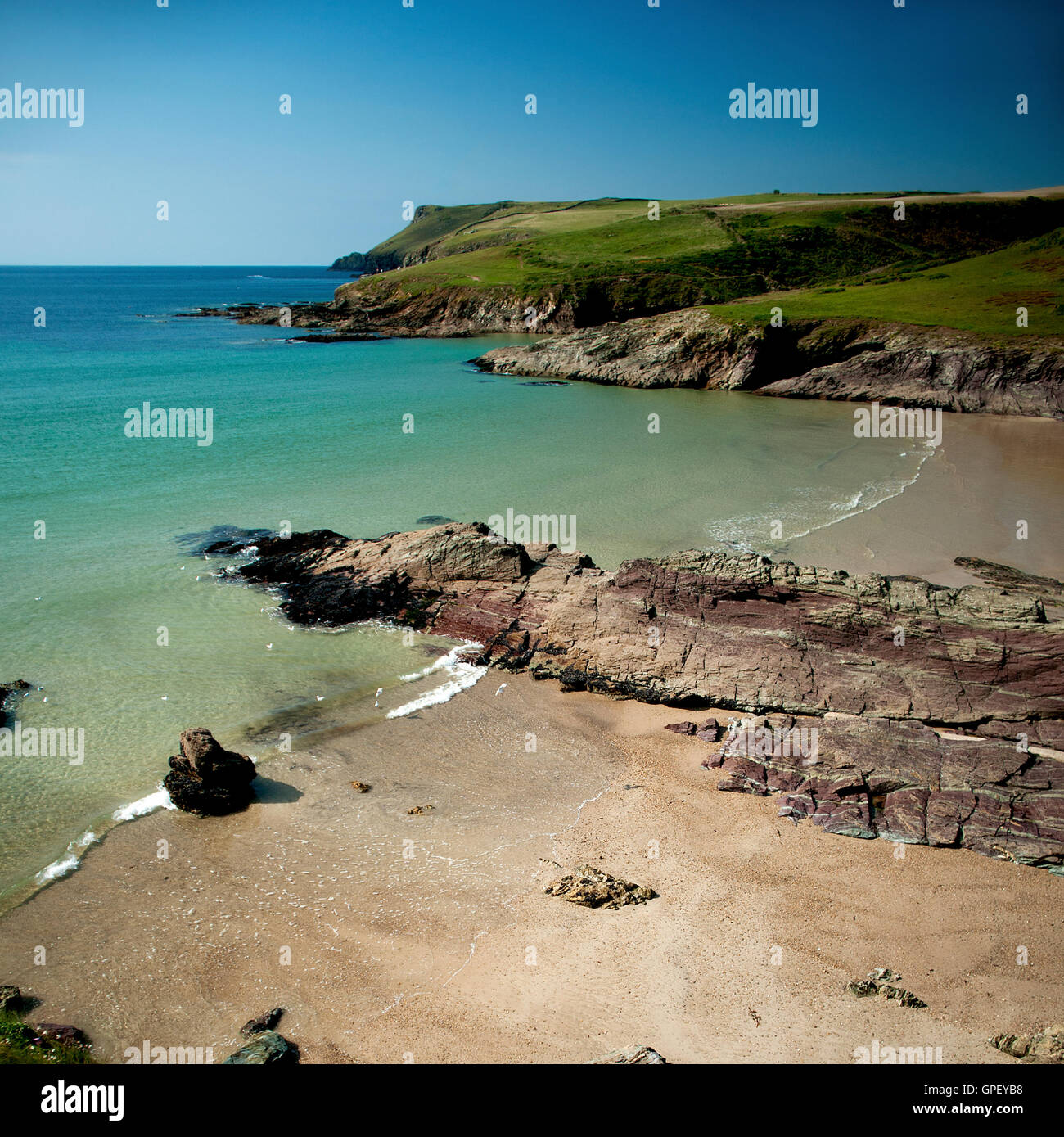 A picturesque bay near the popular surfing beach of Polzeath on the ...