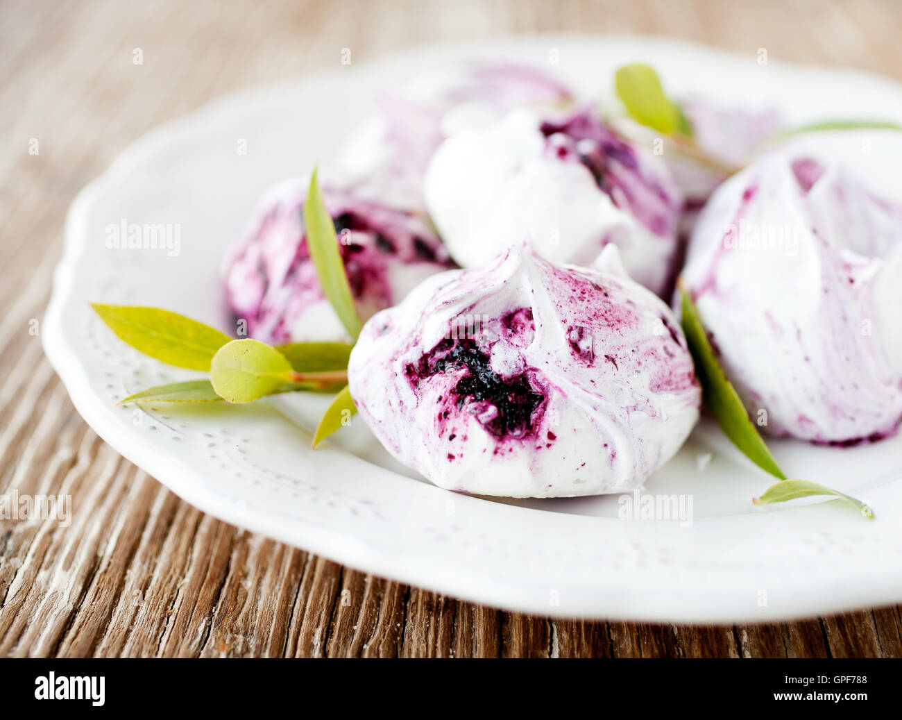 Delicious and beautiful blueberry meringues Stock Photo - Alamy