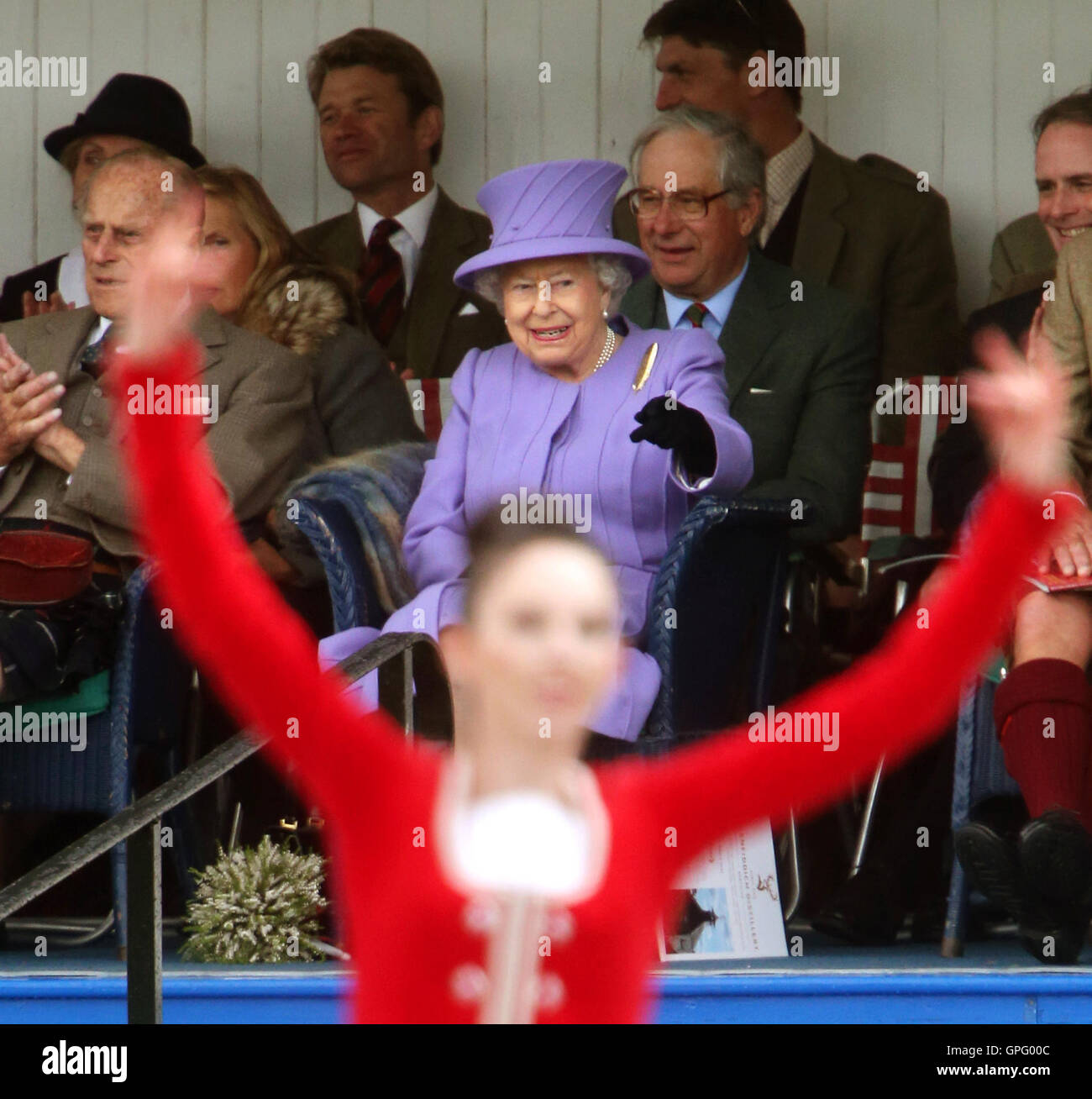Queen Elizabeth II watches Highland dancers as she attends the Braemar ...