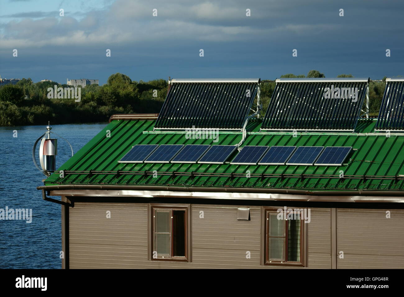 Solar panels wind turbine roof hi-res stock photography and images - Alamy