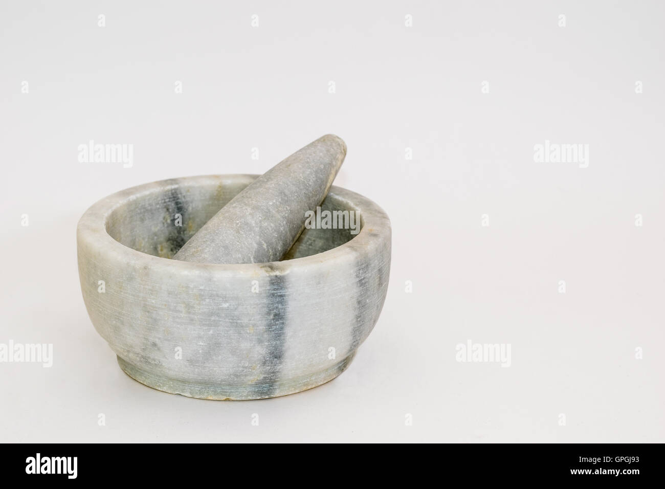Marble mortar and pestle Stock Photo - Alamy