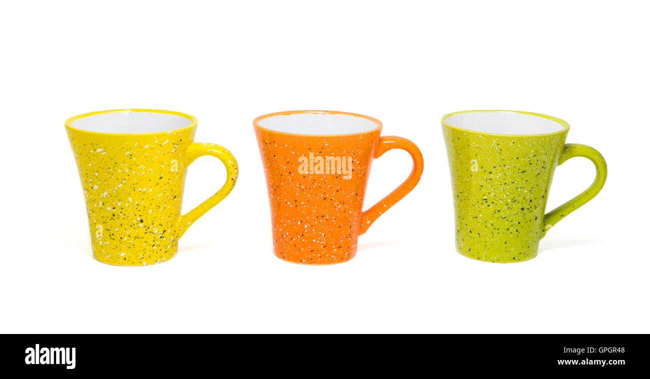 three colorful coffee cups isolated on white background Stock Photo - Alamy