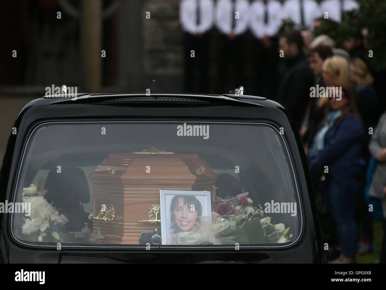 The herse carrying the coffin of Clodagh Hawe arrives at Saint Mary's ...