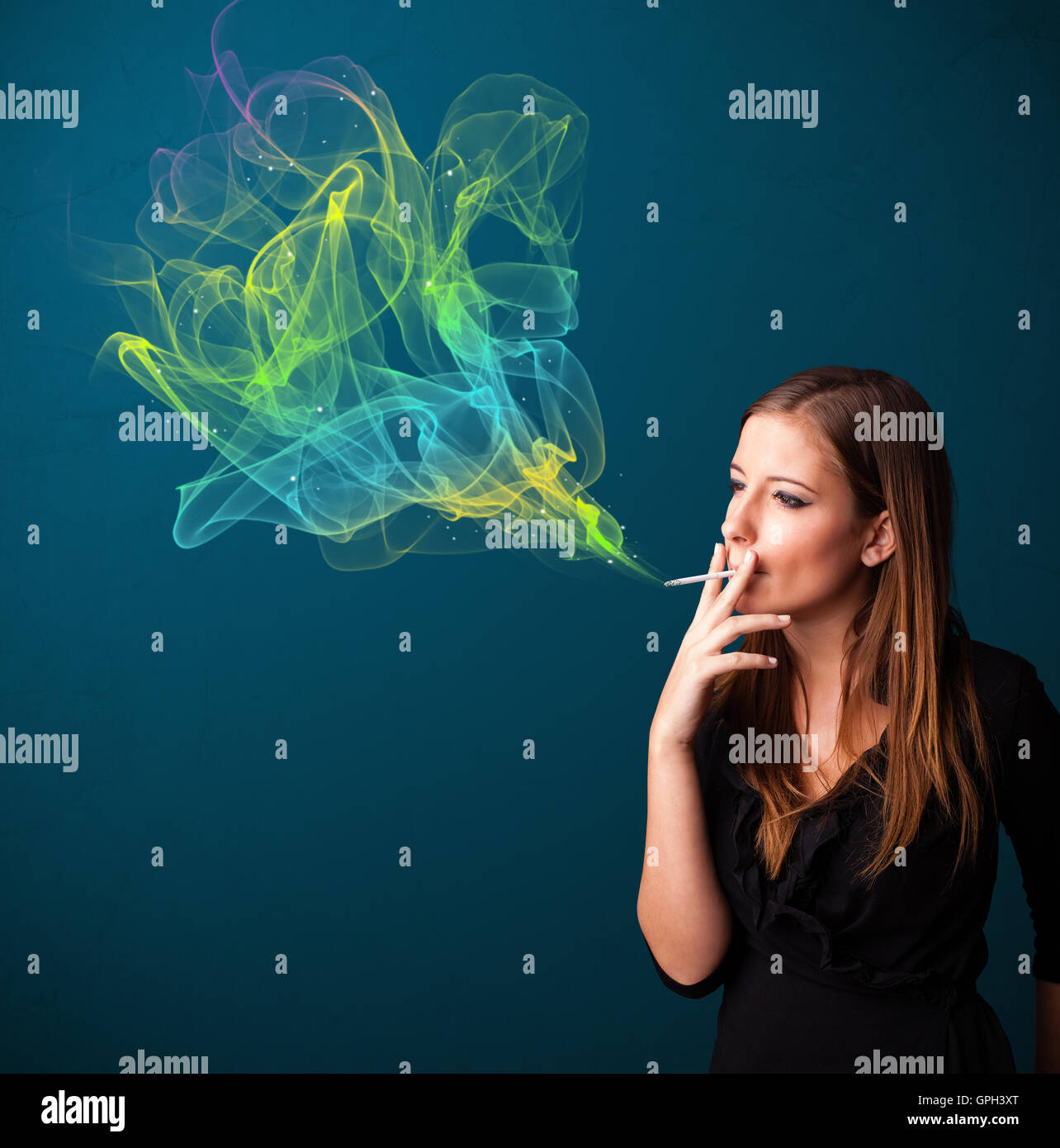 Pretty lady smoking cigarette with colorful smoke Stock Photo - Alamy