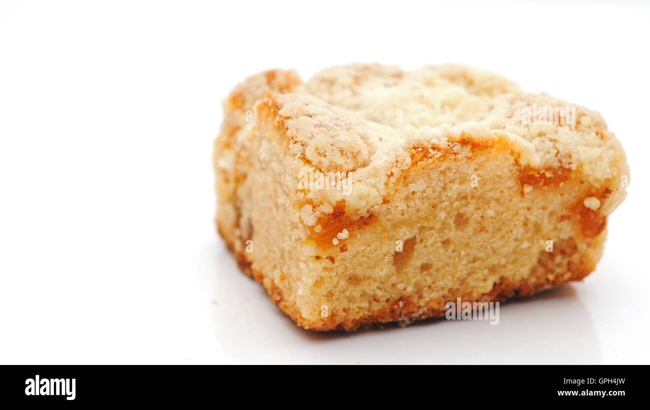 freshly baked slice cake on a white background Stock Photo - Alamy