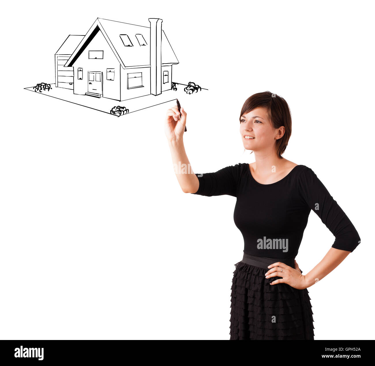 Young woman drawing a house on whiteboard Stock Photo - Alamy