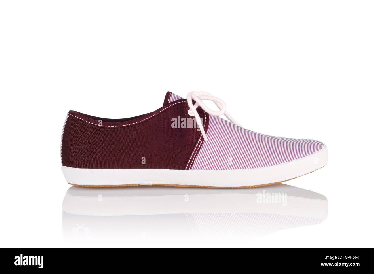 Sporty shoes in sport shoes concept on white Stock Photo - Alamy