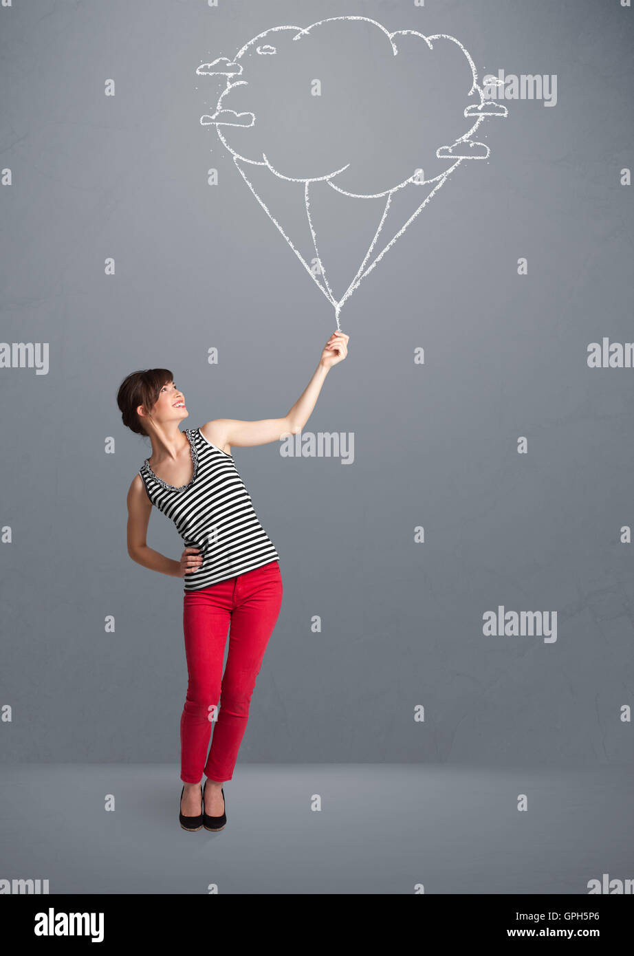 Pretty lady holding a cloud balloon drawing Stock Photo - Alamy