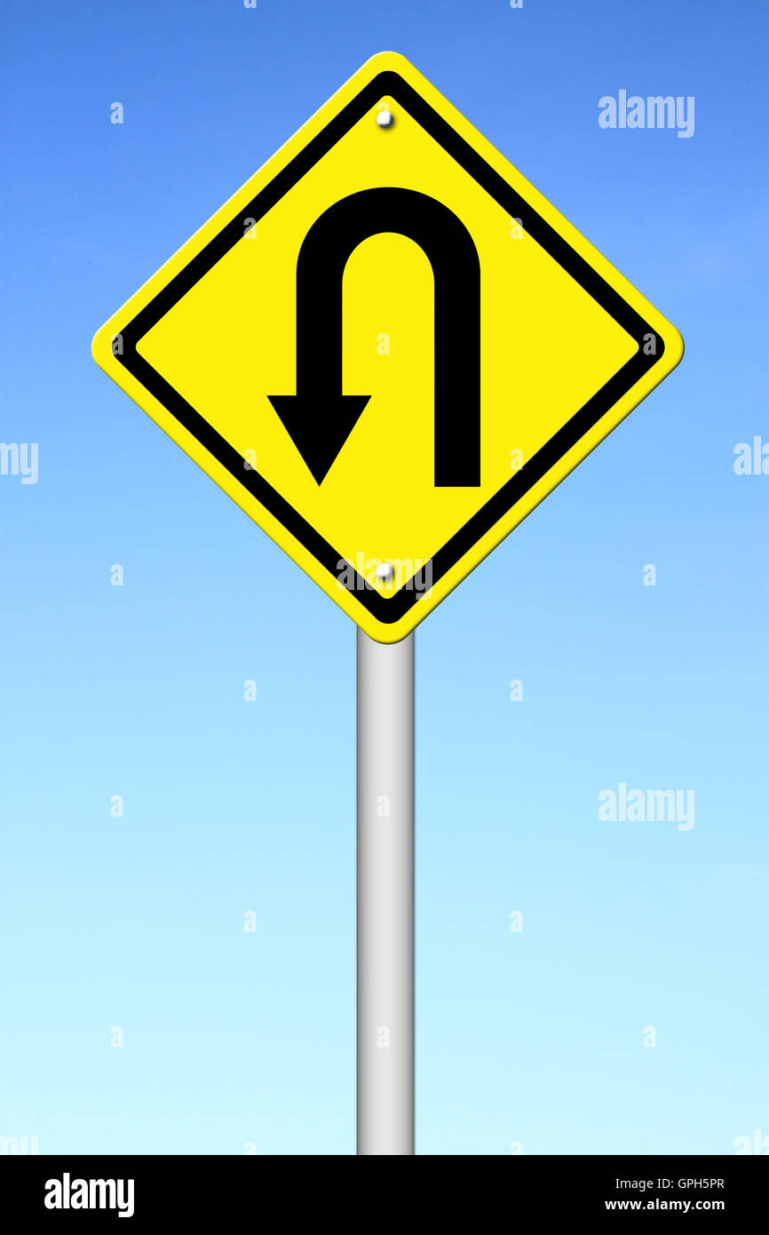 Yellow warning sign u-turn roadsign Stock Photo - Alamy