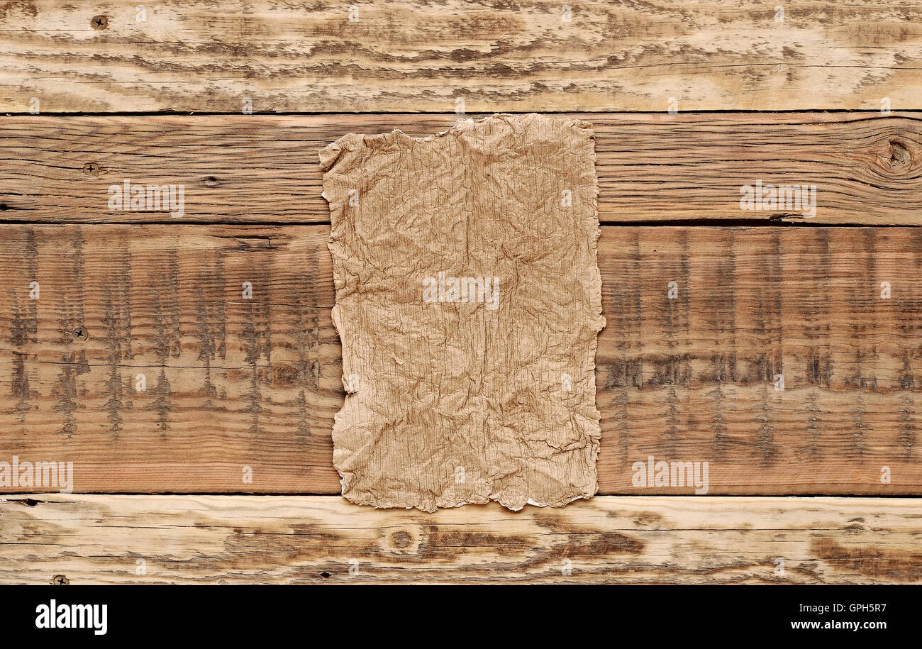 cardboard on wood background Stock Photo - Alamy