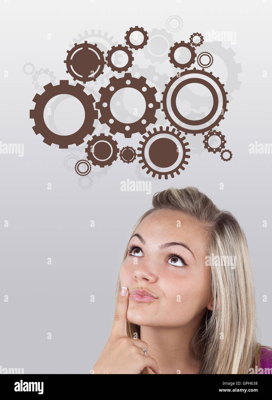 Young girl looking at idea type of sign Stock Photo - Alamy