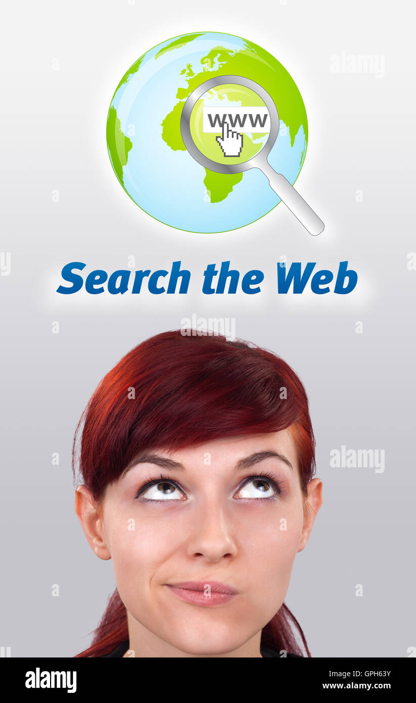 Young girl looking at internet type of icons Stock Photo - Alamy