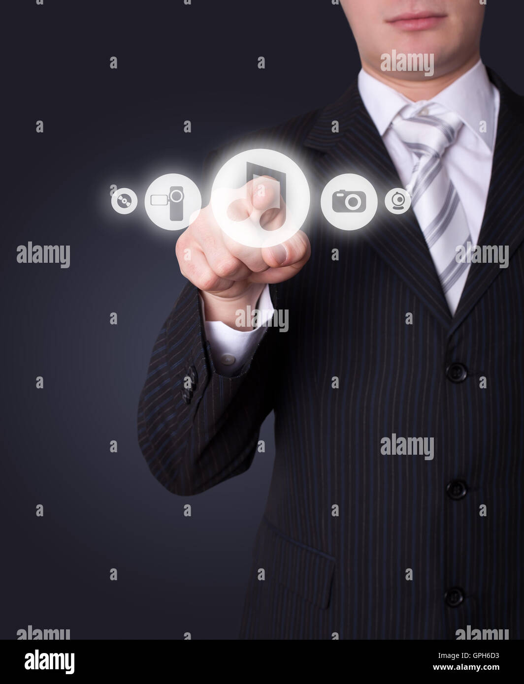 Man pressing media player button Stock Photo - Alamy