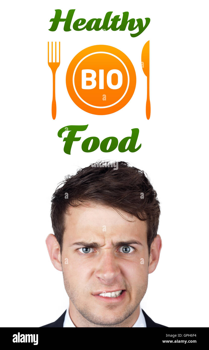 Young head looking at healthy food sign Stock Photo - Alamy