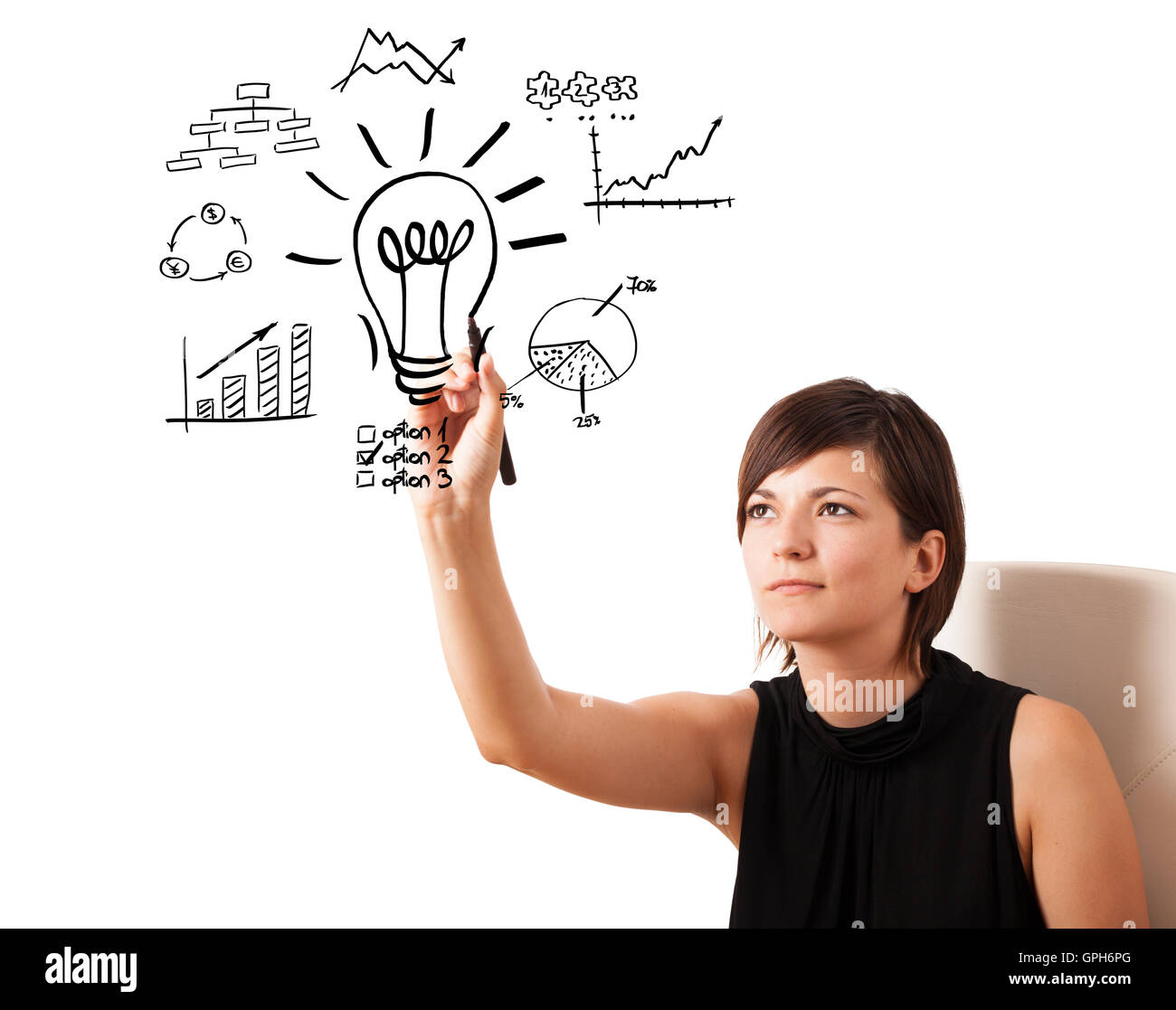 Young business woman drawing light bulb with various diagrams an Stock ...