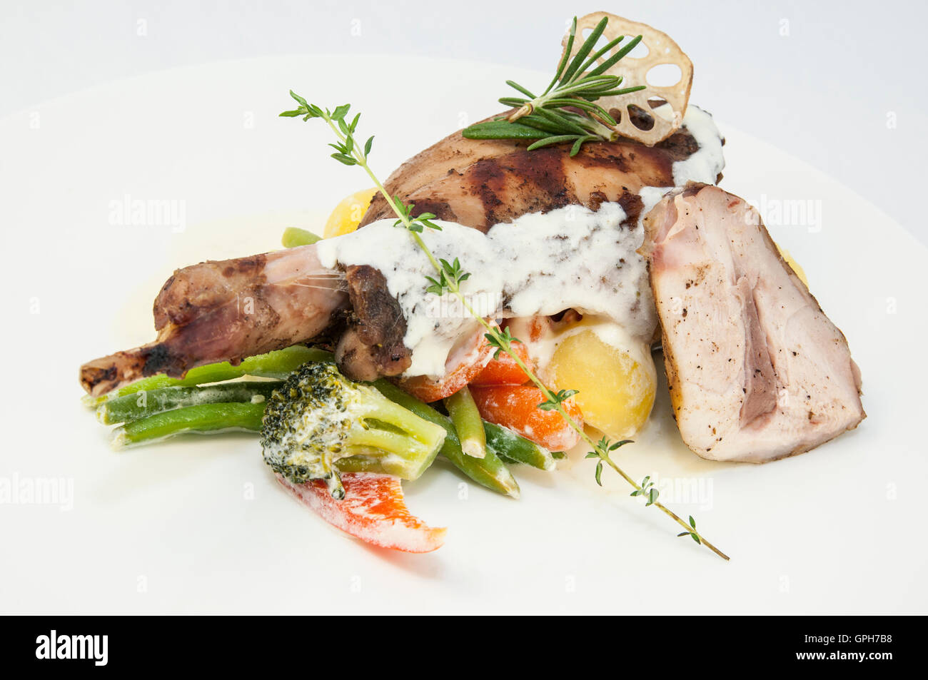 rabbit meat and potatoes Stock Photo - Alamy