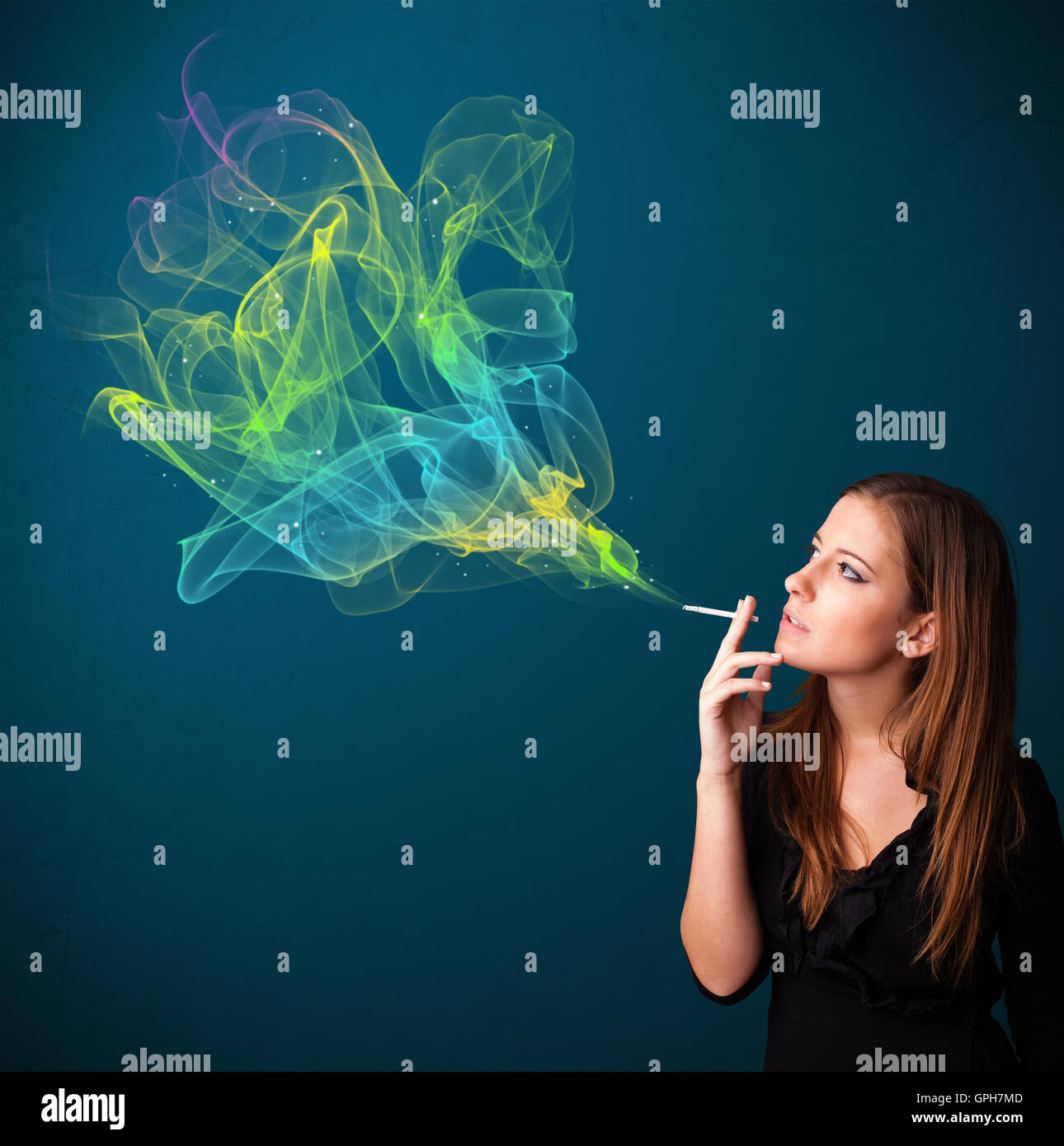 Pretty lady smoking cigarette with colorful smoke Stock Photo - Alamy