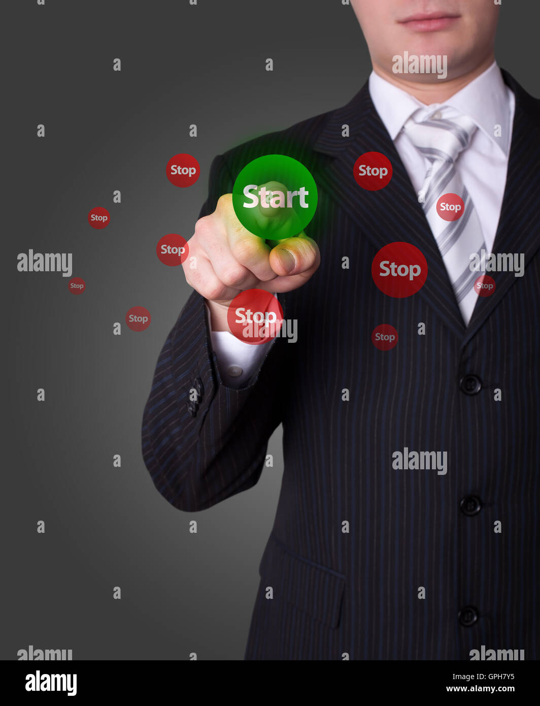Man pressing Start button Stock Photo - Alamy