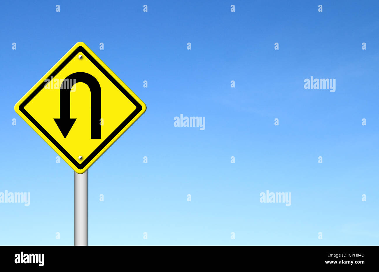 Yellow warning sign u-turn roadsign with blue sky background Stock ...