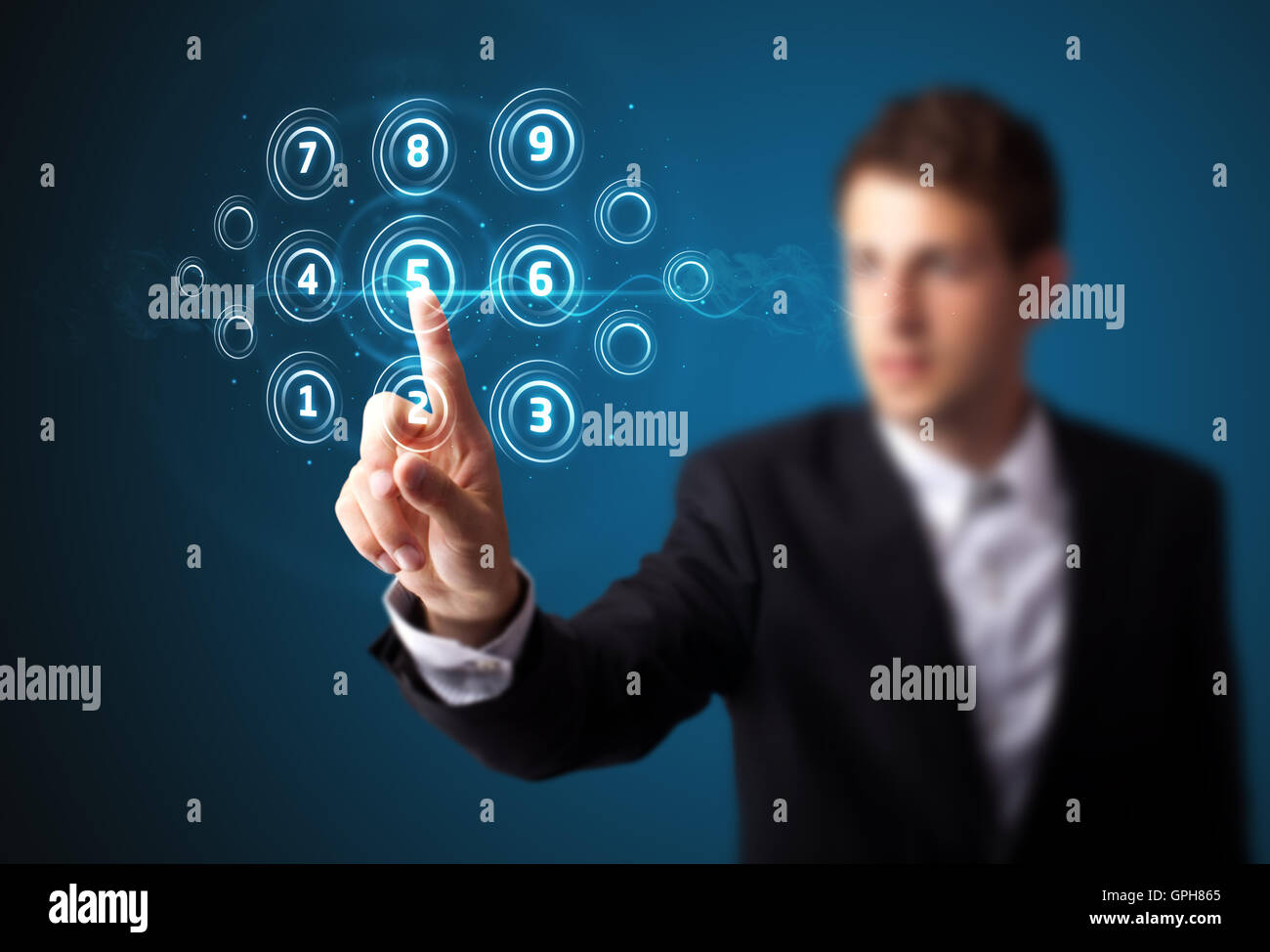 Businessman pressing high tech type of modern buttons Stock Photo - Alamy