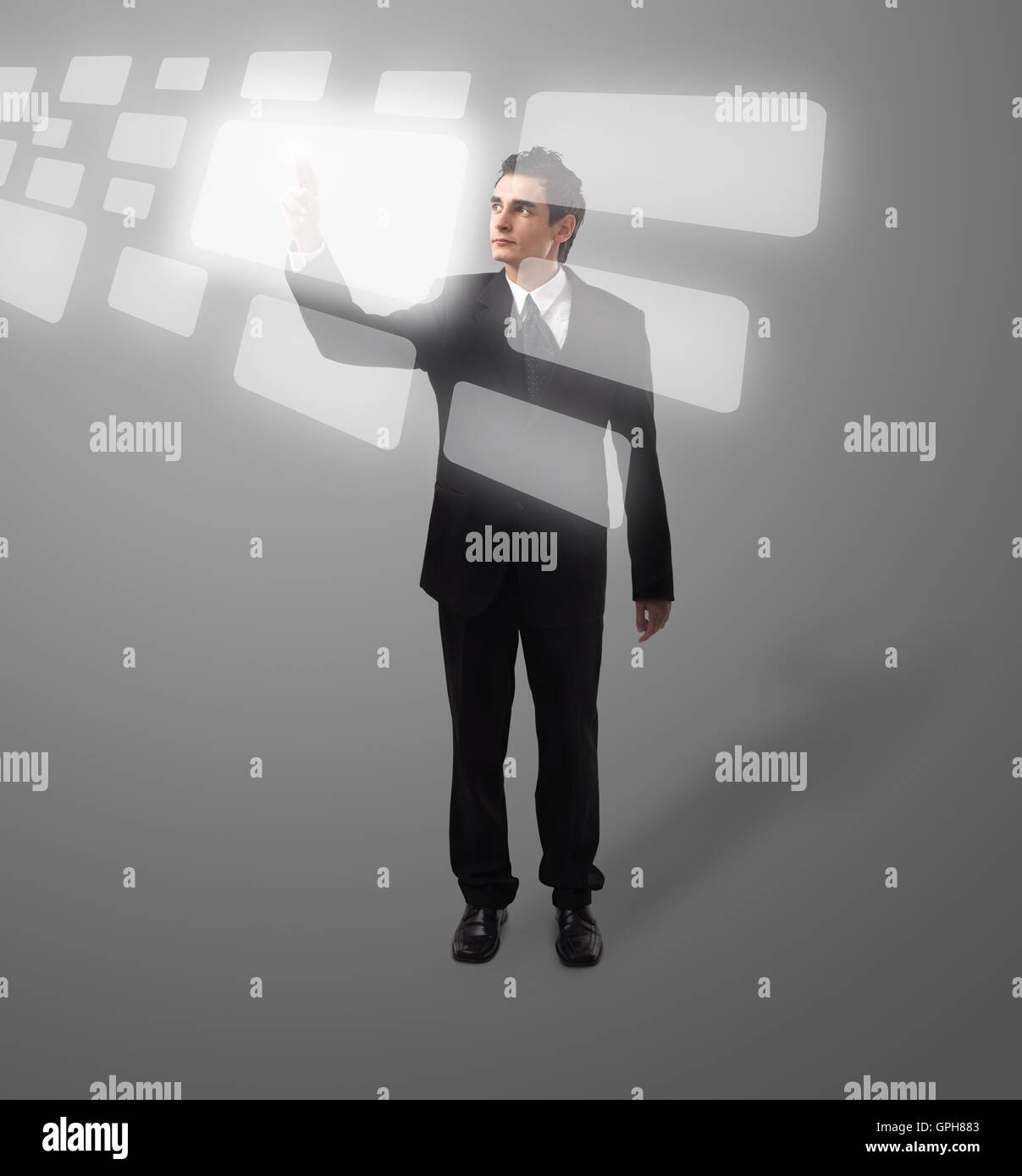 Business man pressing button Stock Photo - Alamy