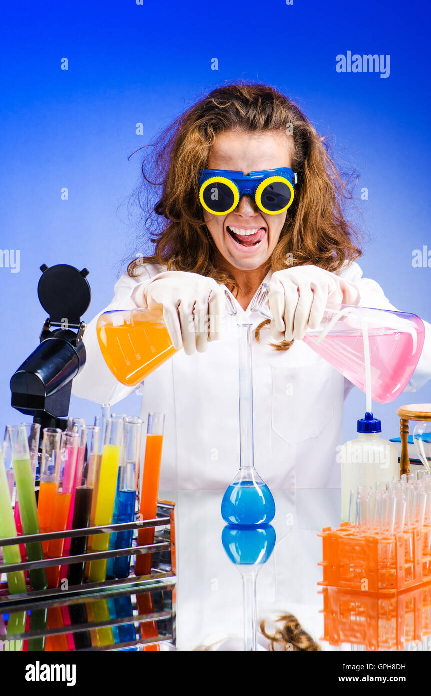 Funny female chemist in lab Stock Photo - Alamy