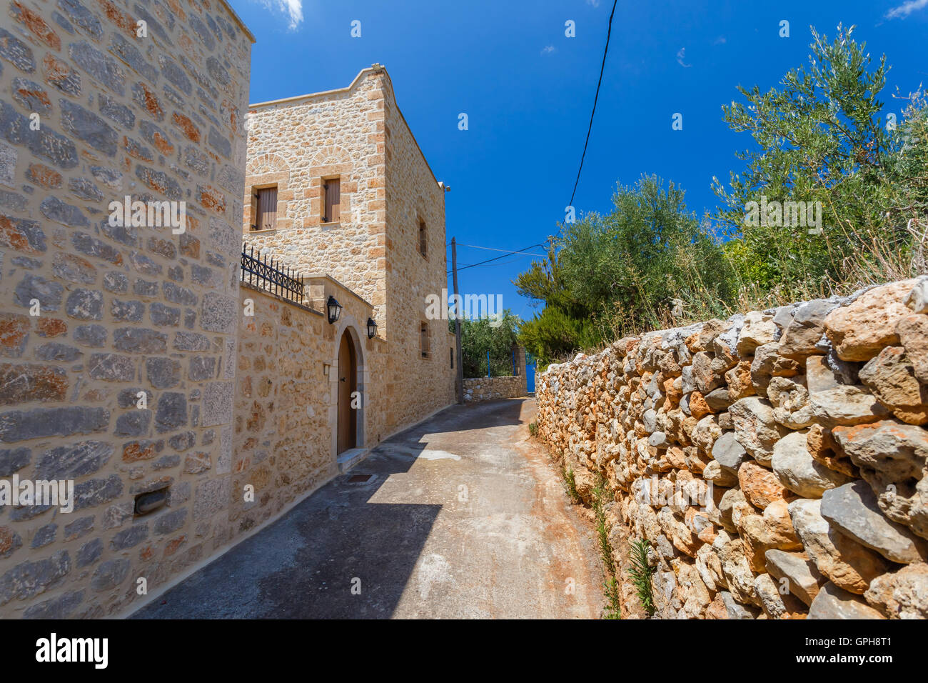 Traditional style built houses and hostels in Itilo village against a ...